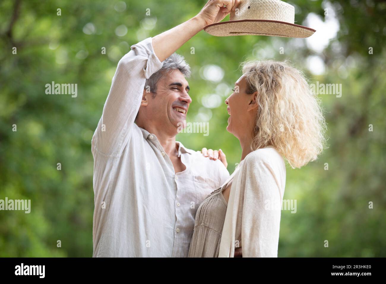 Man lifts hat hi-res stock photography and images - Alamy