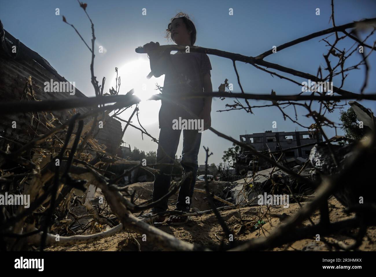 Gaza, Palestine. 23rd May, 2023. A Palestinian girl stands next to the ...