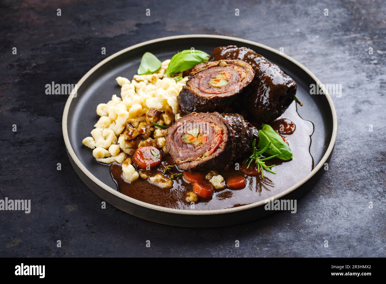Traditional slow cooked German wagyu beef roulades with spaetzle served ...