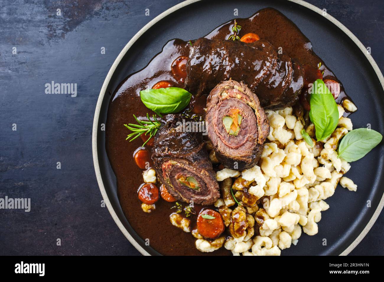 Traditional slow cooked German wagyu beef roulades with spaetzle served ...