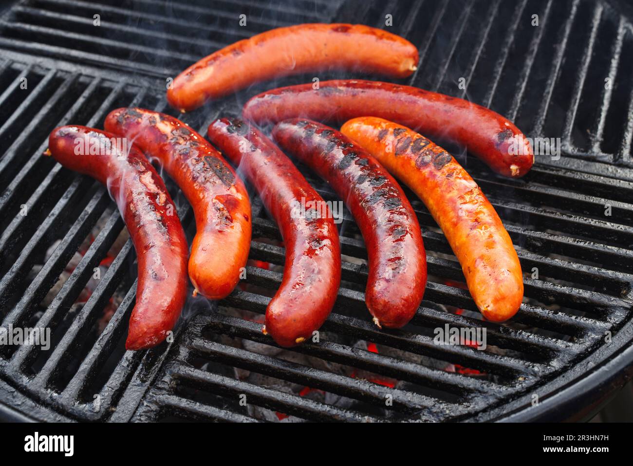 Traditional German barbecue Bratwurst sausages offered as close-up on a ...