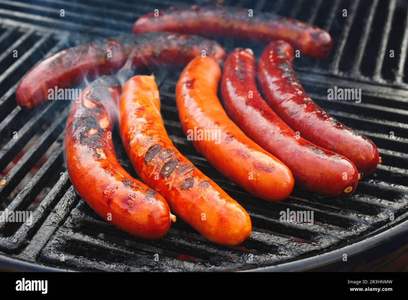 Traditional German barbecue Bratwurst sausages offered as close-up on a ...