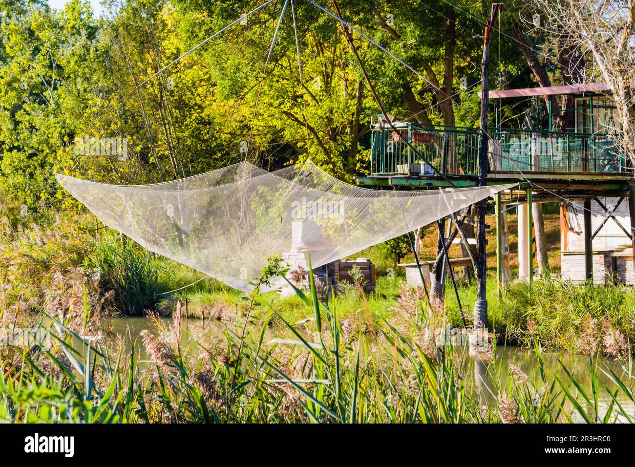 Fishing hut on lagoon Stock Photo - Alamy