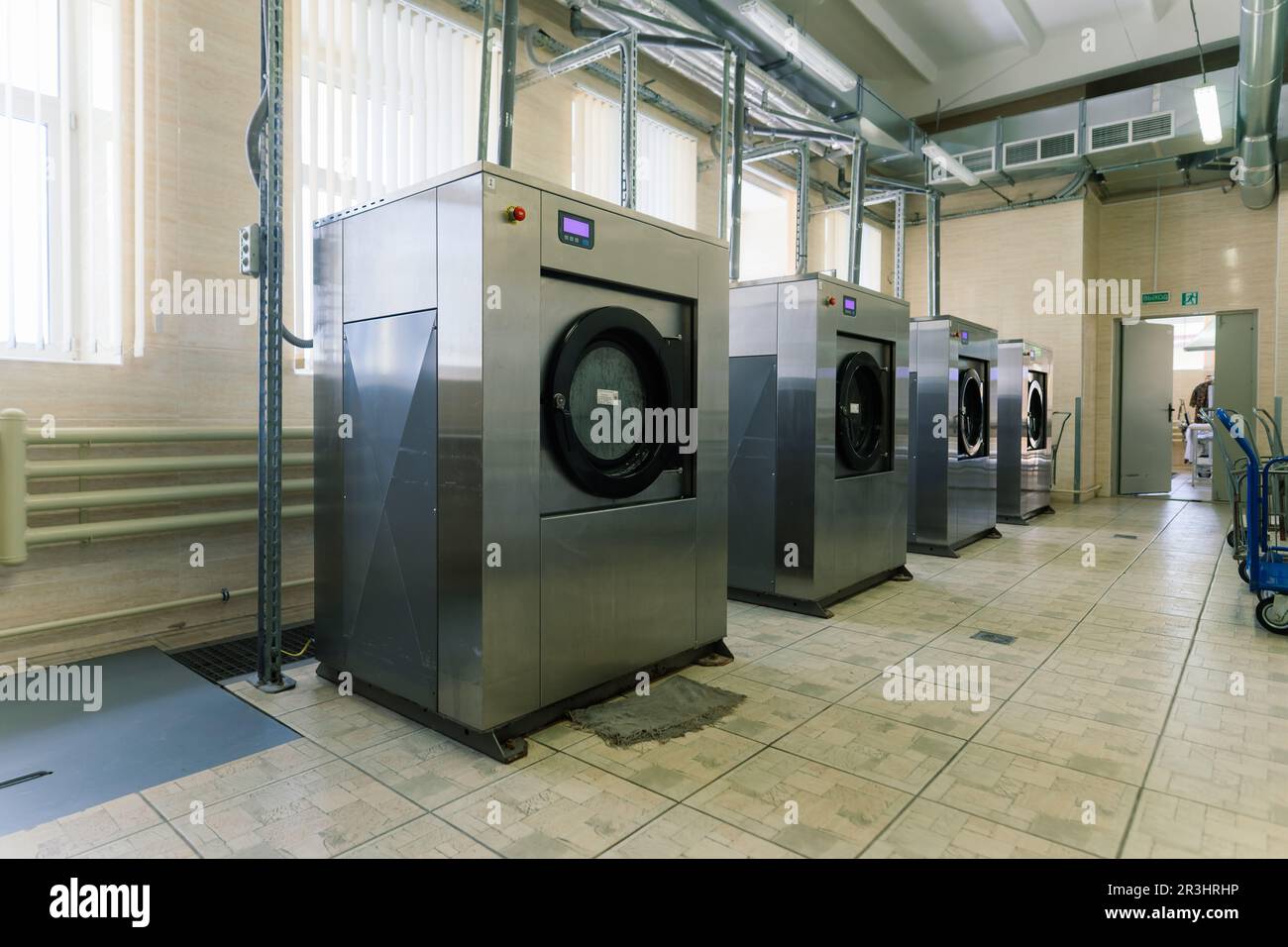 Industrial Washing in public shop, business and laundry Stock Photo - Alamy