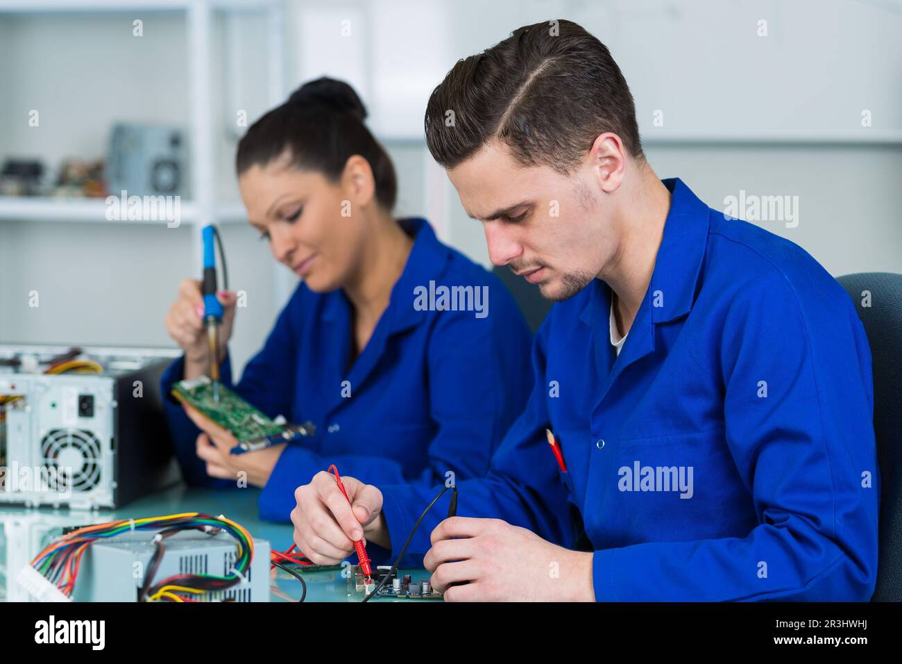 apprentices electronicians working on circuits Stock Photo - Alamy