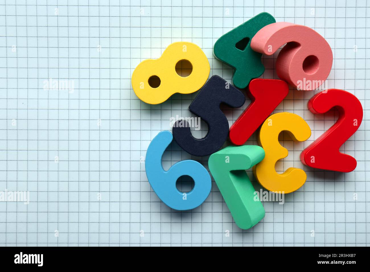 Colorful numbers on sheet of grid paper, flat lay Stock Photo - Alamy