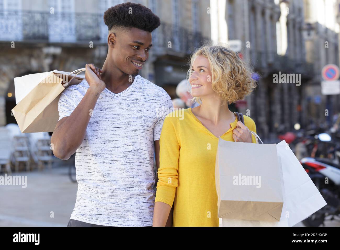 Happy diverse couple bags hi-res stock photography and images - Alamy