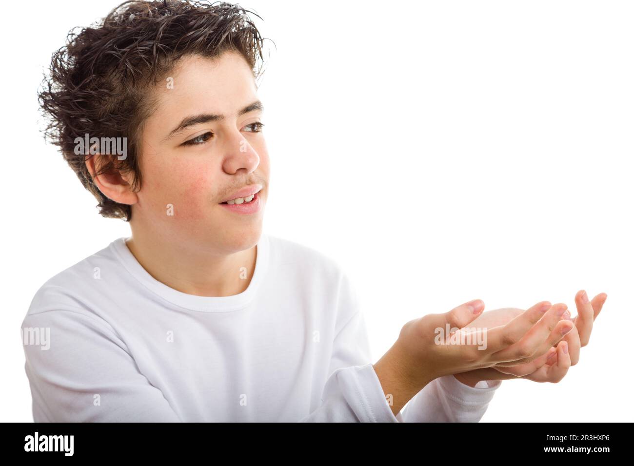 Caucasian boy holds hands with palms upwards to receive Stock Photo - Alamy