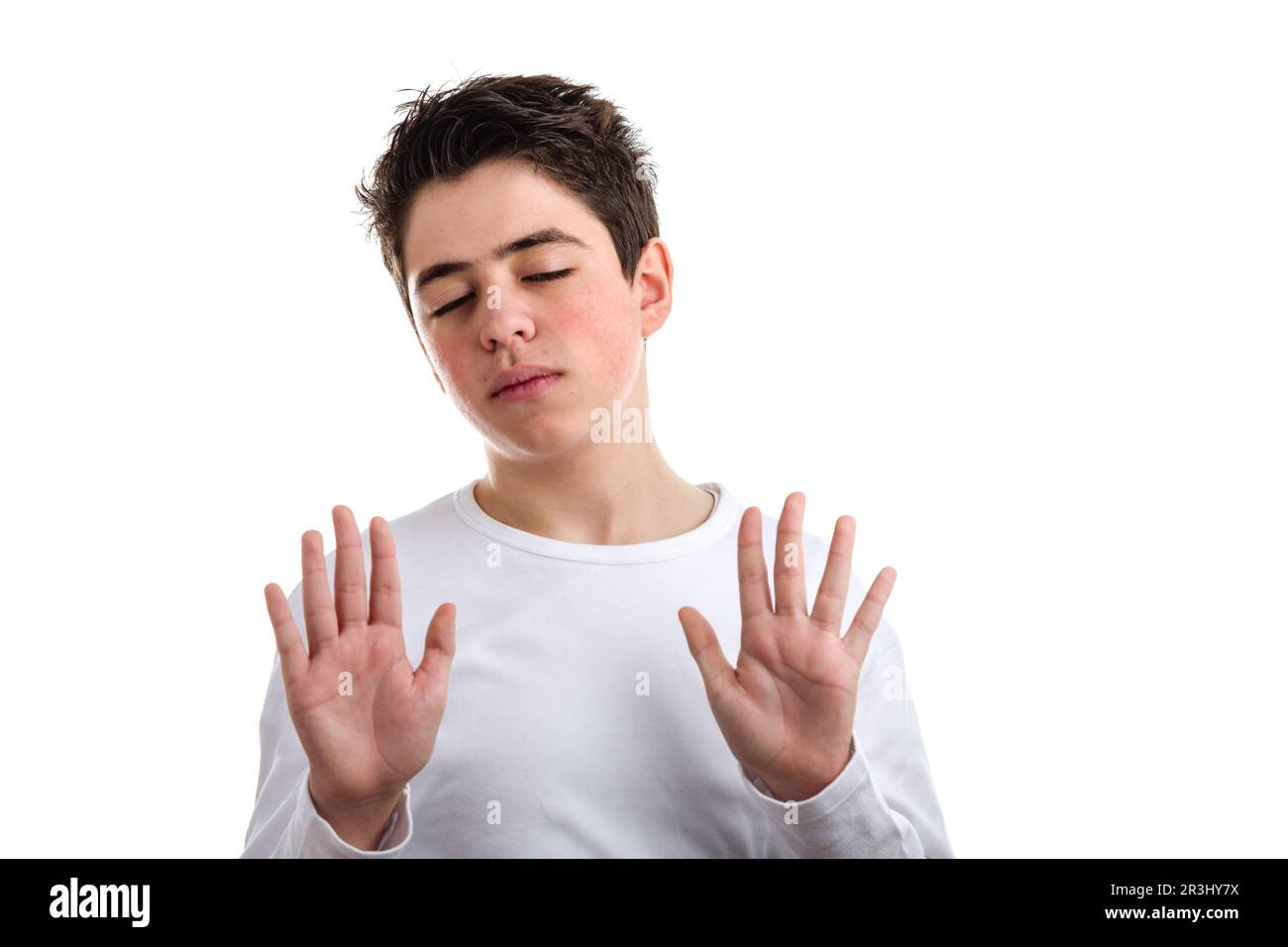 Downward hand gesture by Caucasian teen with acne skin Stock Photo - Alamy