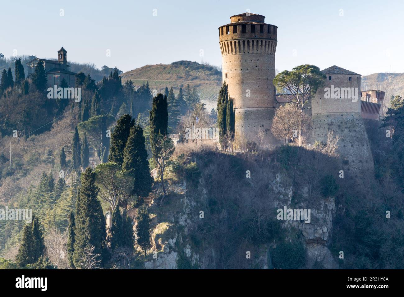Medieval Fortress and Sanctuary in misty hills Stock Photo - Alamy