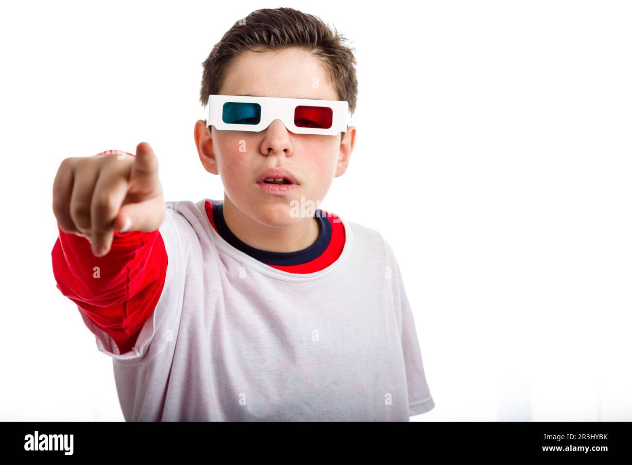 Sleepy Boy wears 3D glasses and points astonished Stock Photo - Alamy