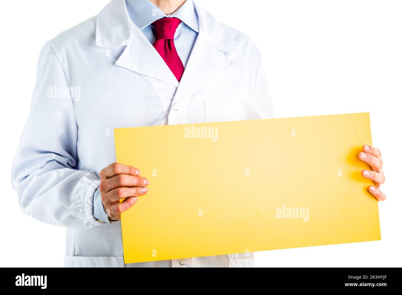 Doctor in white coat showing a yellow signboard Stock Photo - Alamy