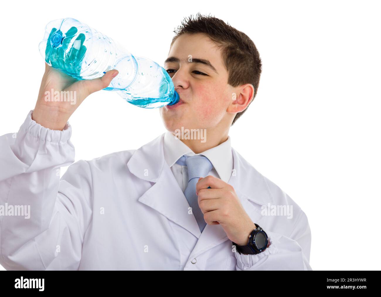 Boy doctor drinking water from plastic bottle Stock Photo - Alamy