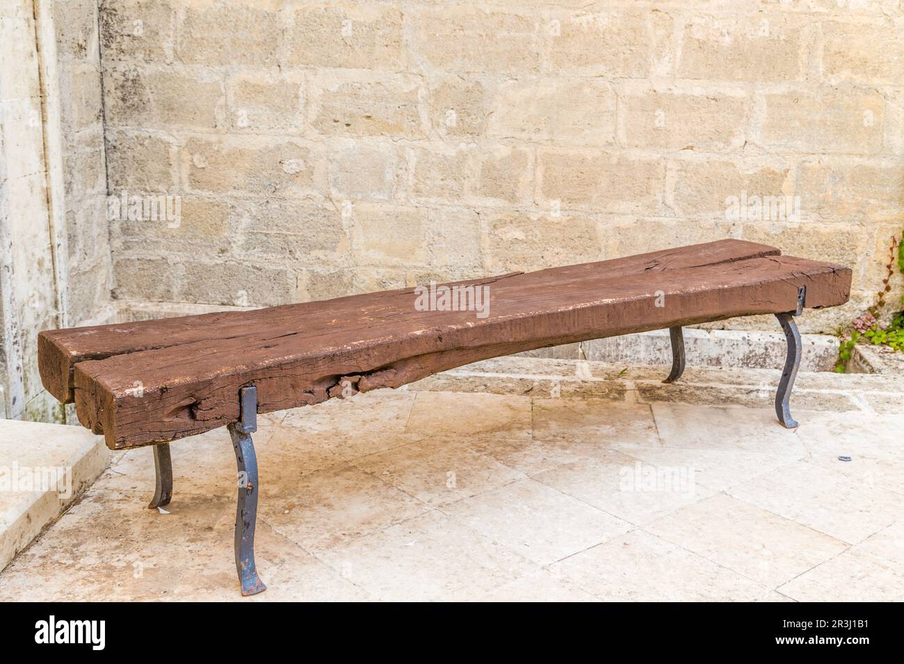 Medieval wooden bench Stock Photo - Alamy