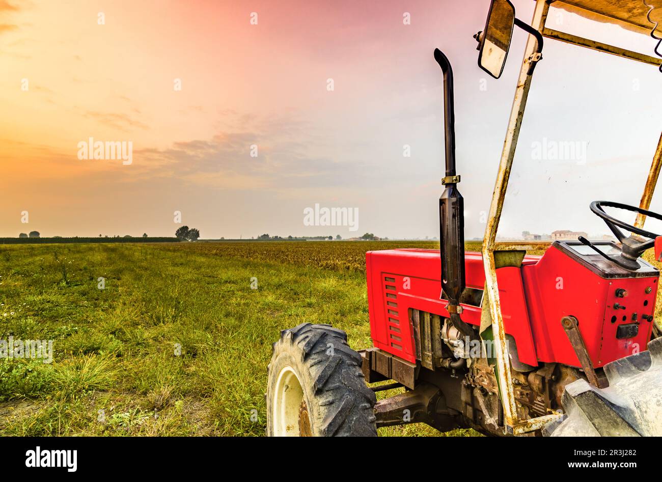 Red and yellow tractor hi-res stock photography and images - Alamy