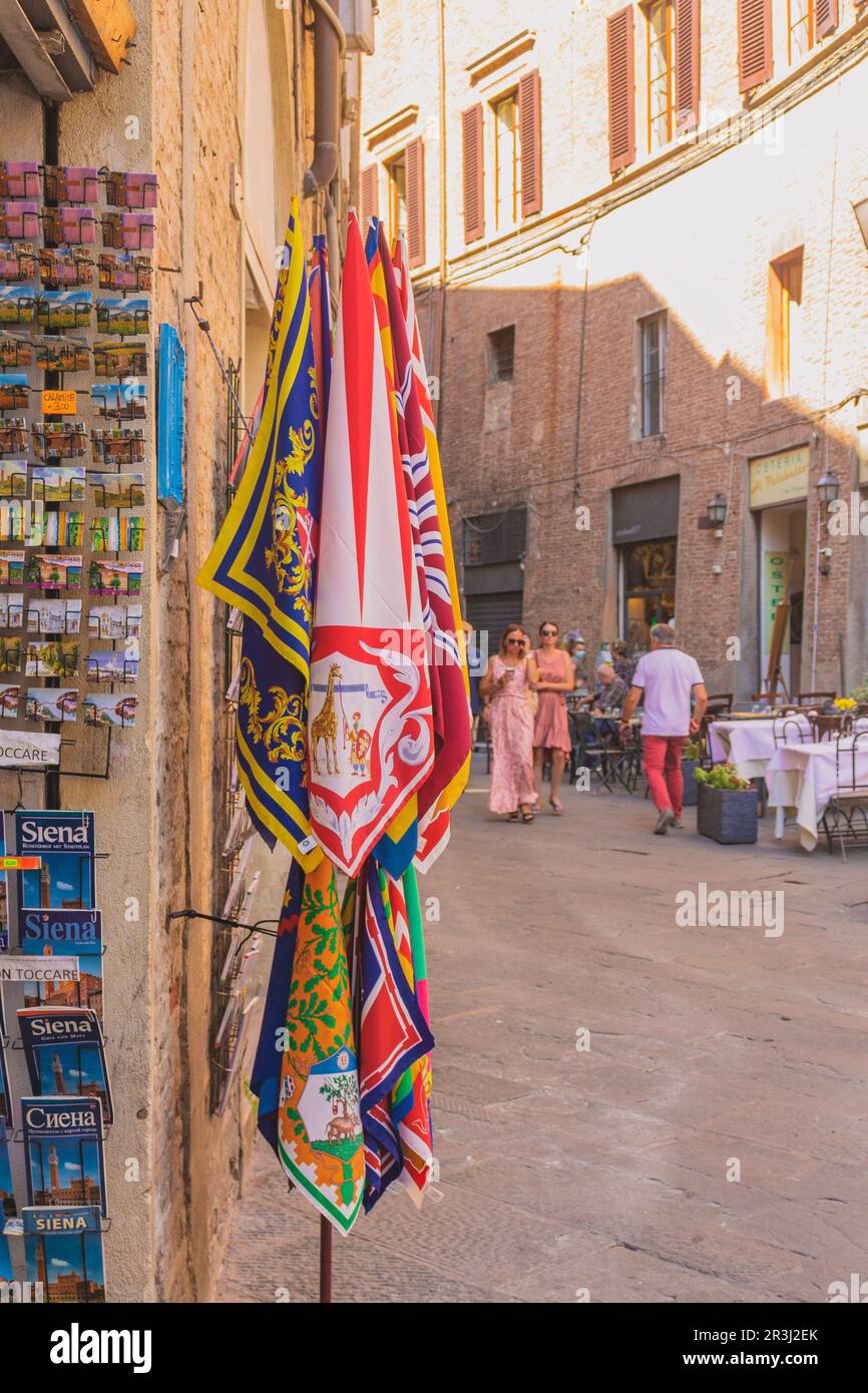 Flags of the contrade of the palio of siena hi-res stock photography ...