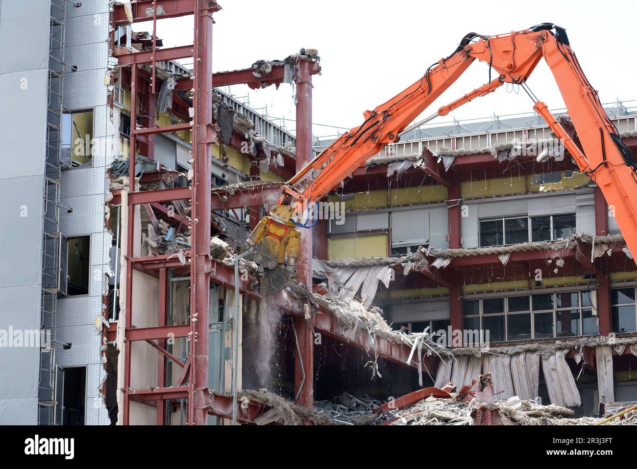 Building demolition work. Heavy construction equipment Stock Photo - Alamy