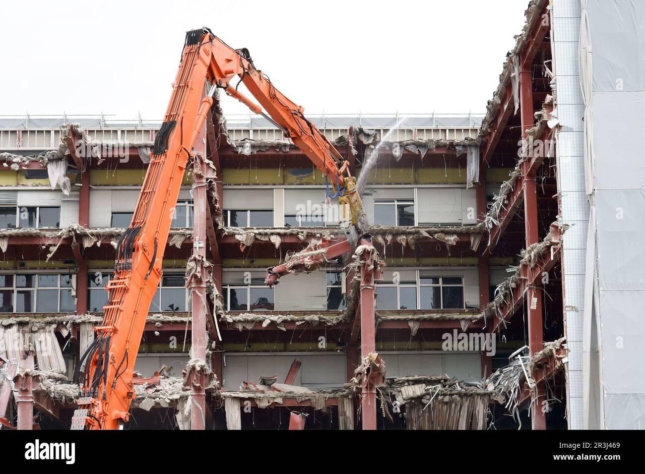 Building demolition work. Heavy construction equipment Stock Photo - Alamy