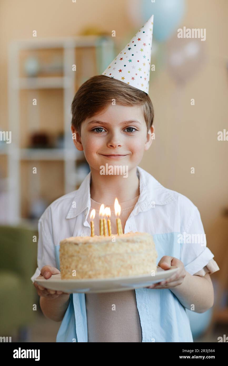 Child boy holding birthday cake hi-res stock photography and images - Alamy
