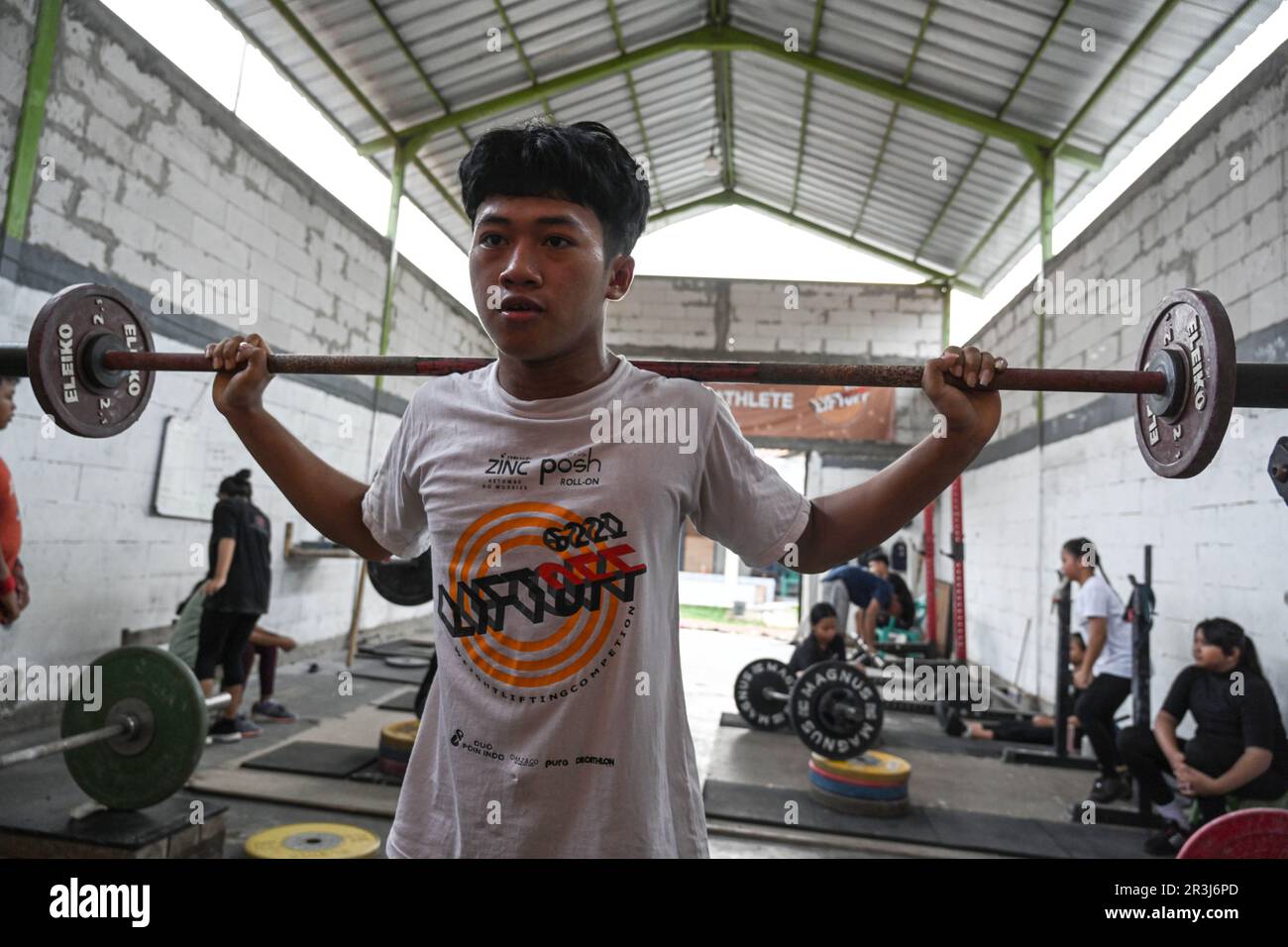 Bogor, Indonesia. 23rd May, 2023. A boy practices weightlifting at ...