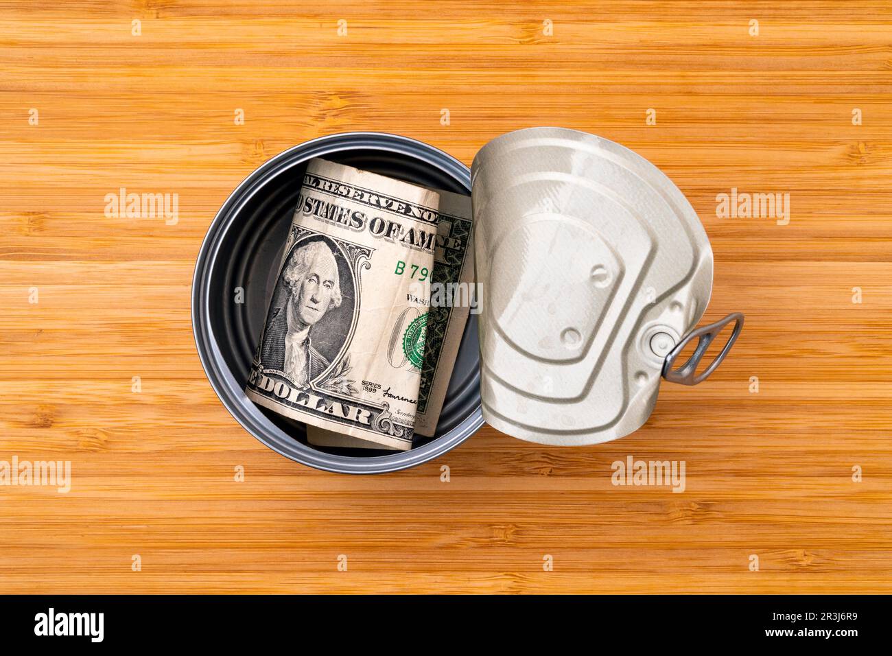 Money can hi-res stock photography and images - Alamy
