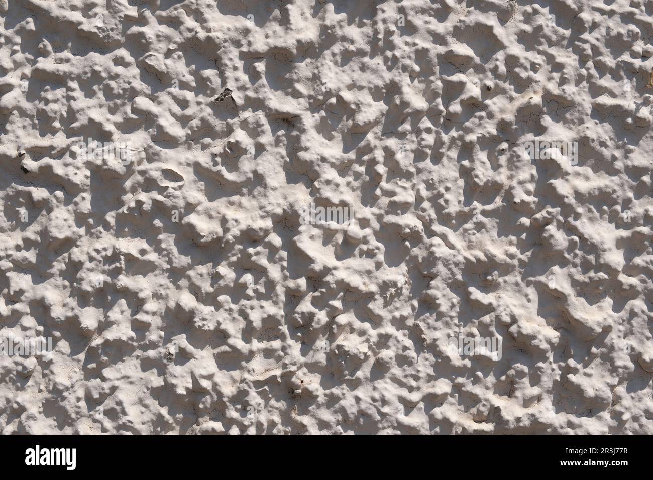 Surface with grey rough plaster Stock Photo - Alamy