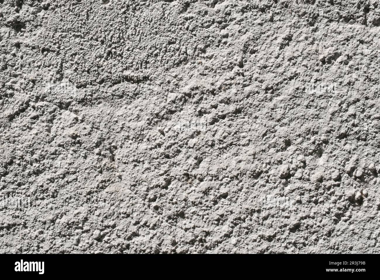 Surface with grey rough plaster Stock Photo - Alamy