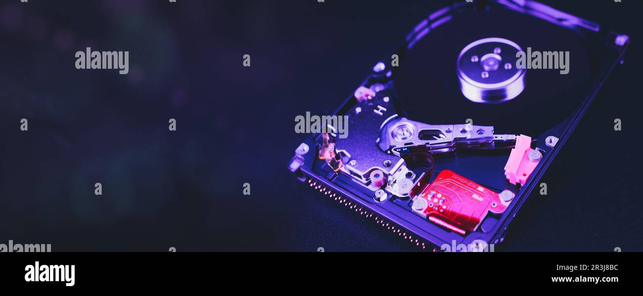 Disassembled open hard disk drive HDD of computer or laptop lies on ...