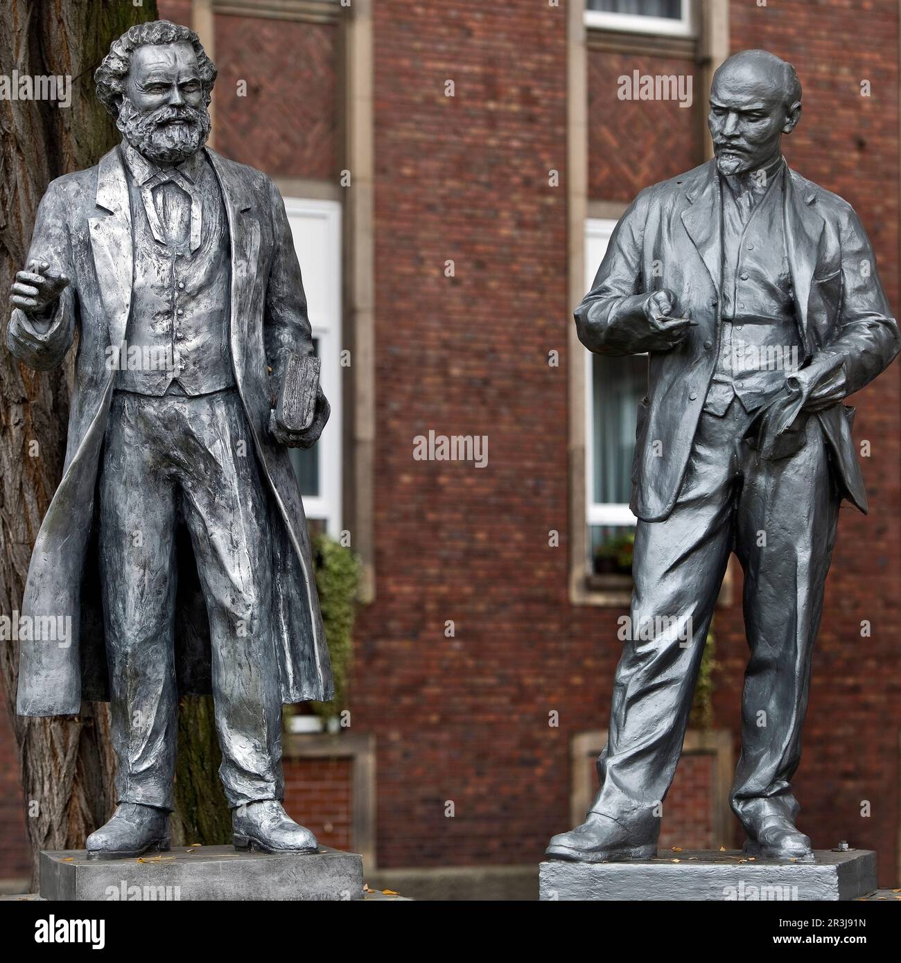 Statues of Marx and Lenin in front of the Central Committee of the MLPD ...