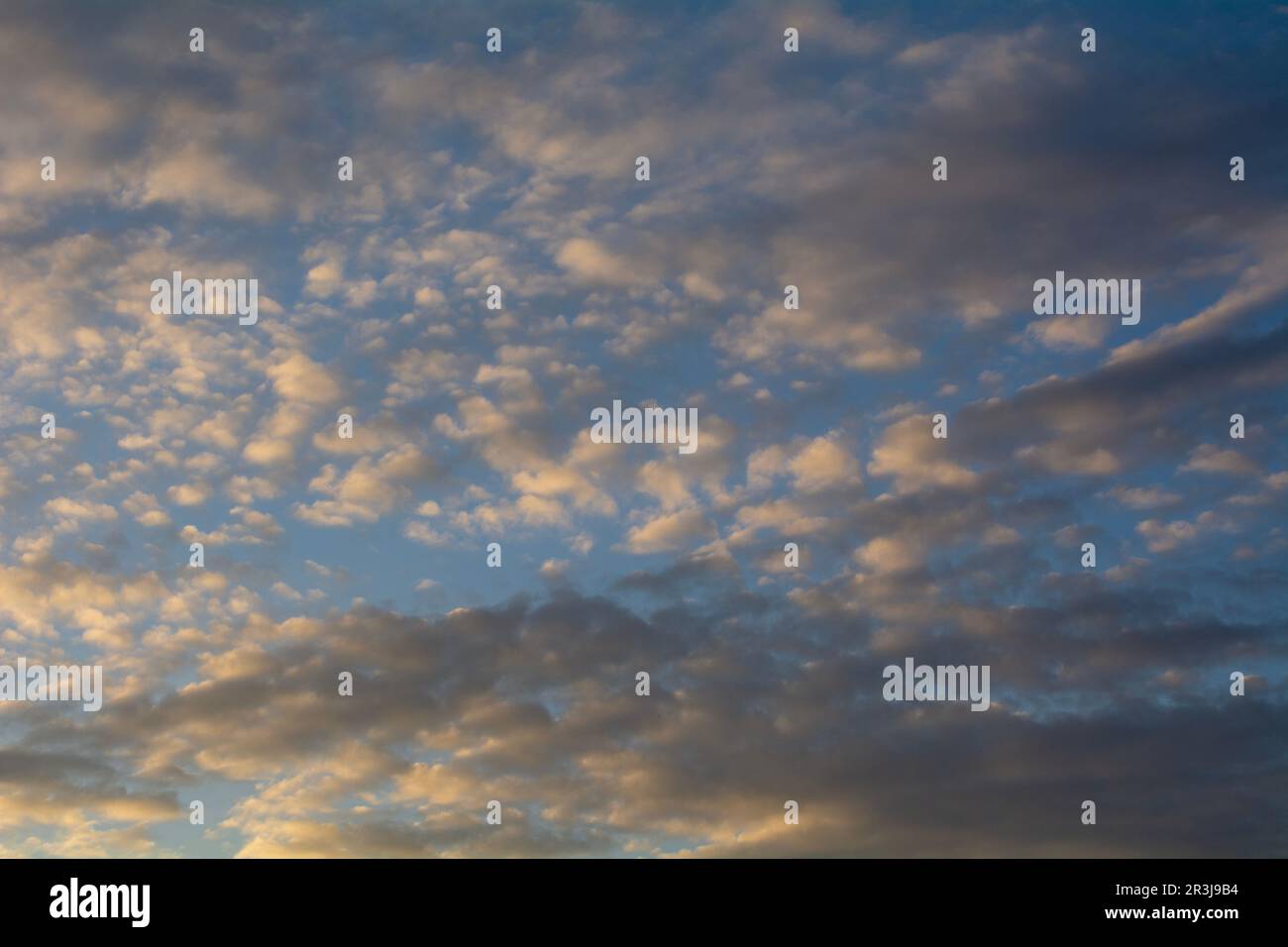 The setting sun illuminating the sky Stock Photo - Alamy