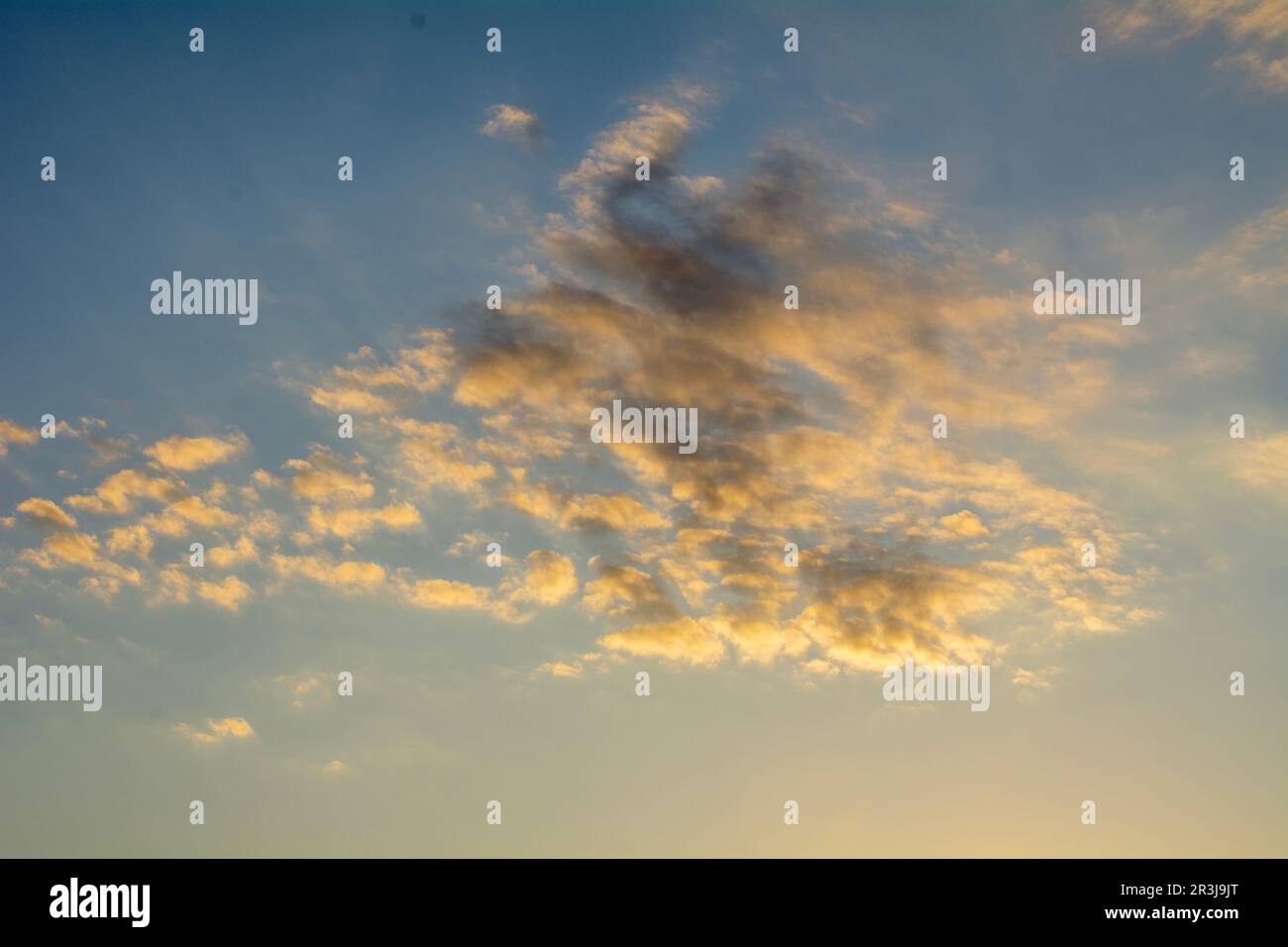The setting sun illuminating the sky Stock Photo - Alamy