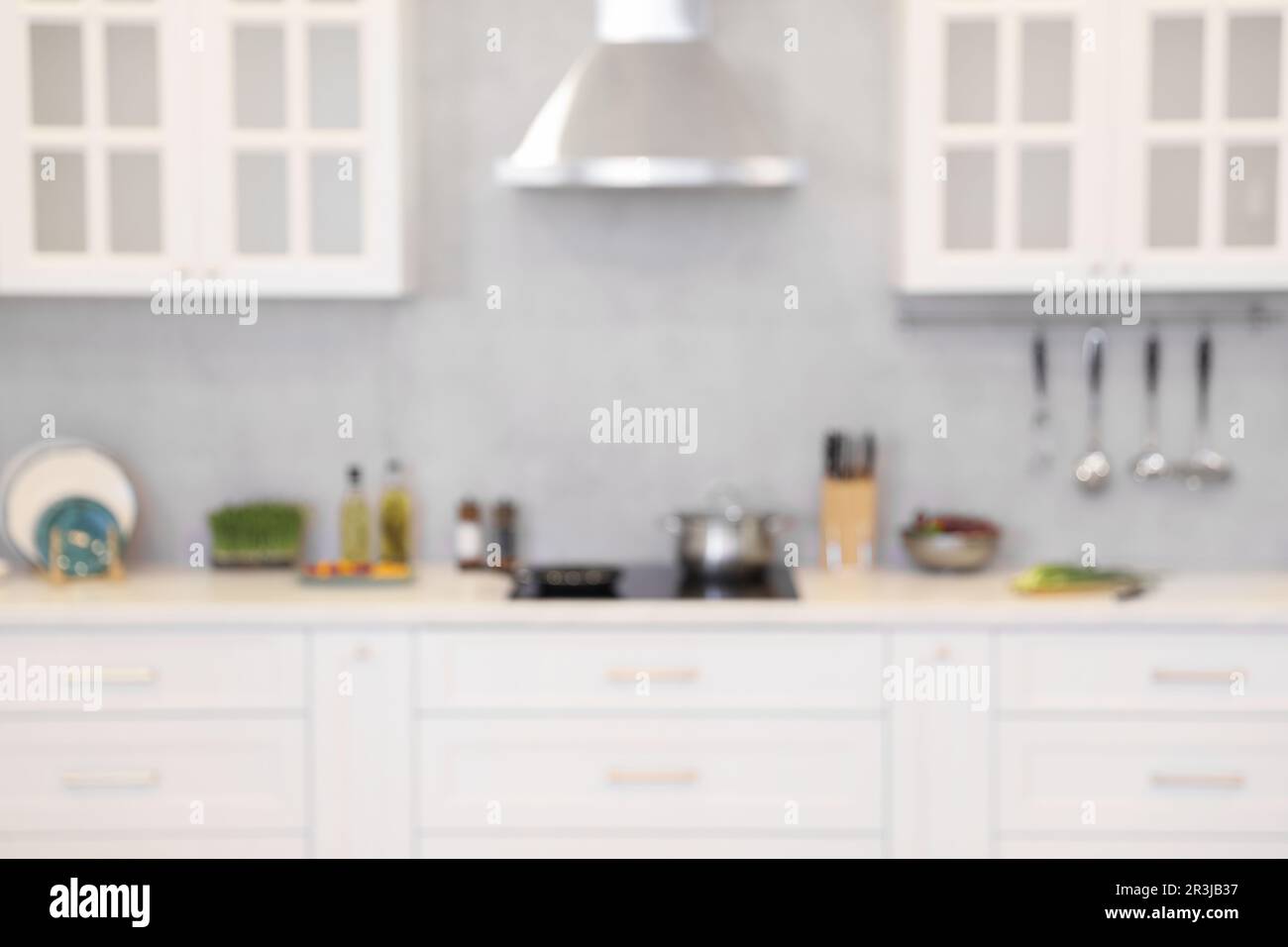 Blurred view of modern kitchen. Interior design Stock Photo - Alamy