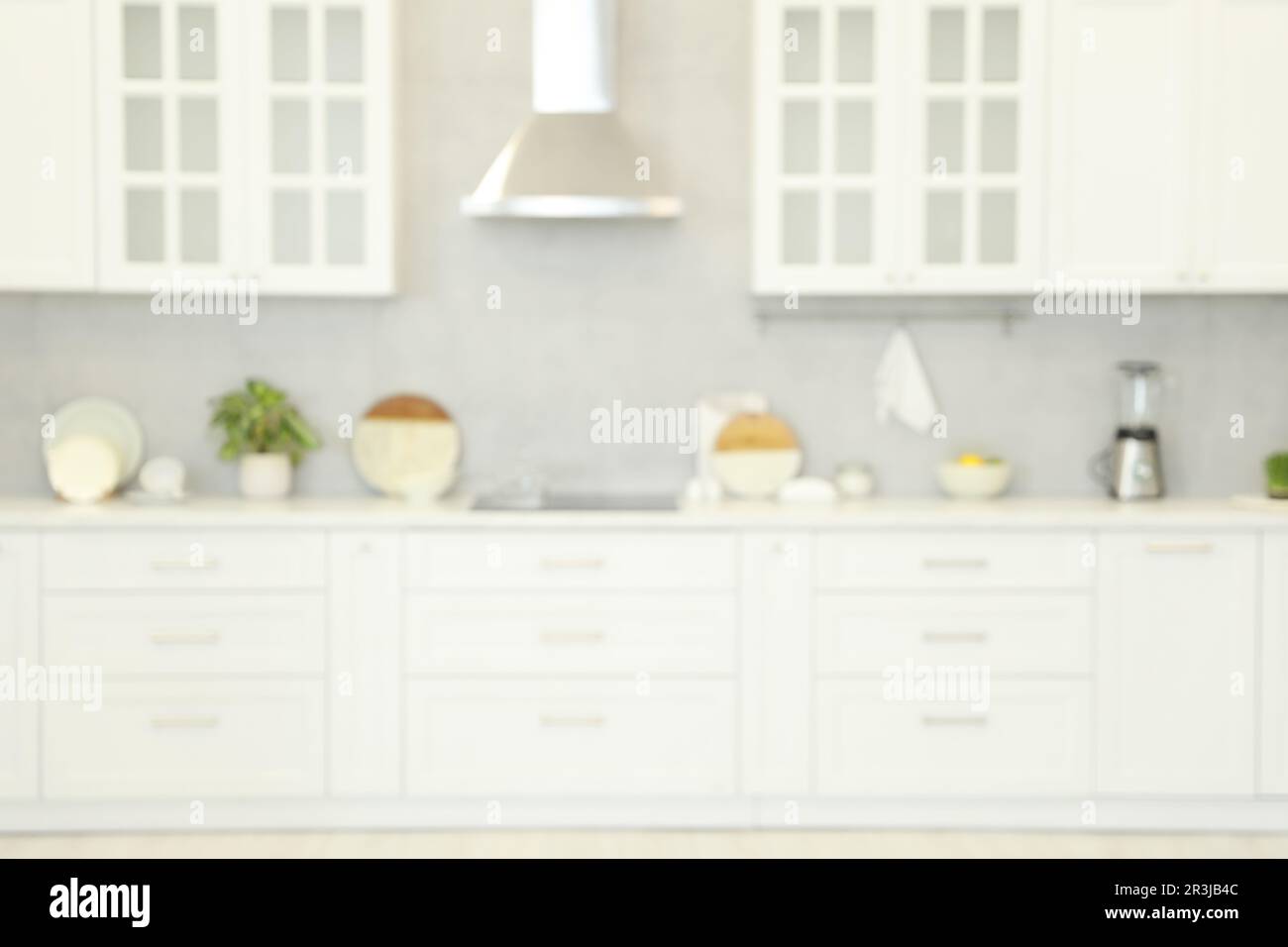 Blurred view of modern kitchen. Interior design Stock Photo - Alamy