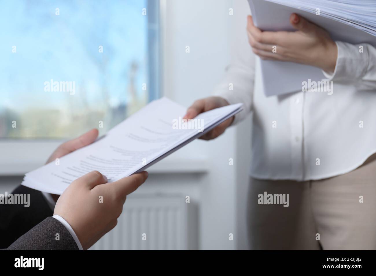 Business woman giving correspondence hi-res stock photography and ...