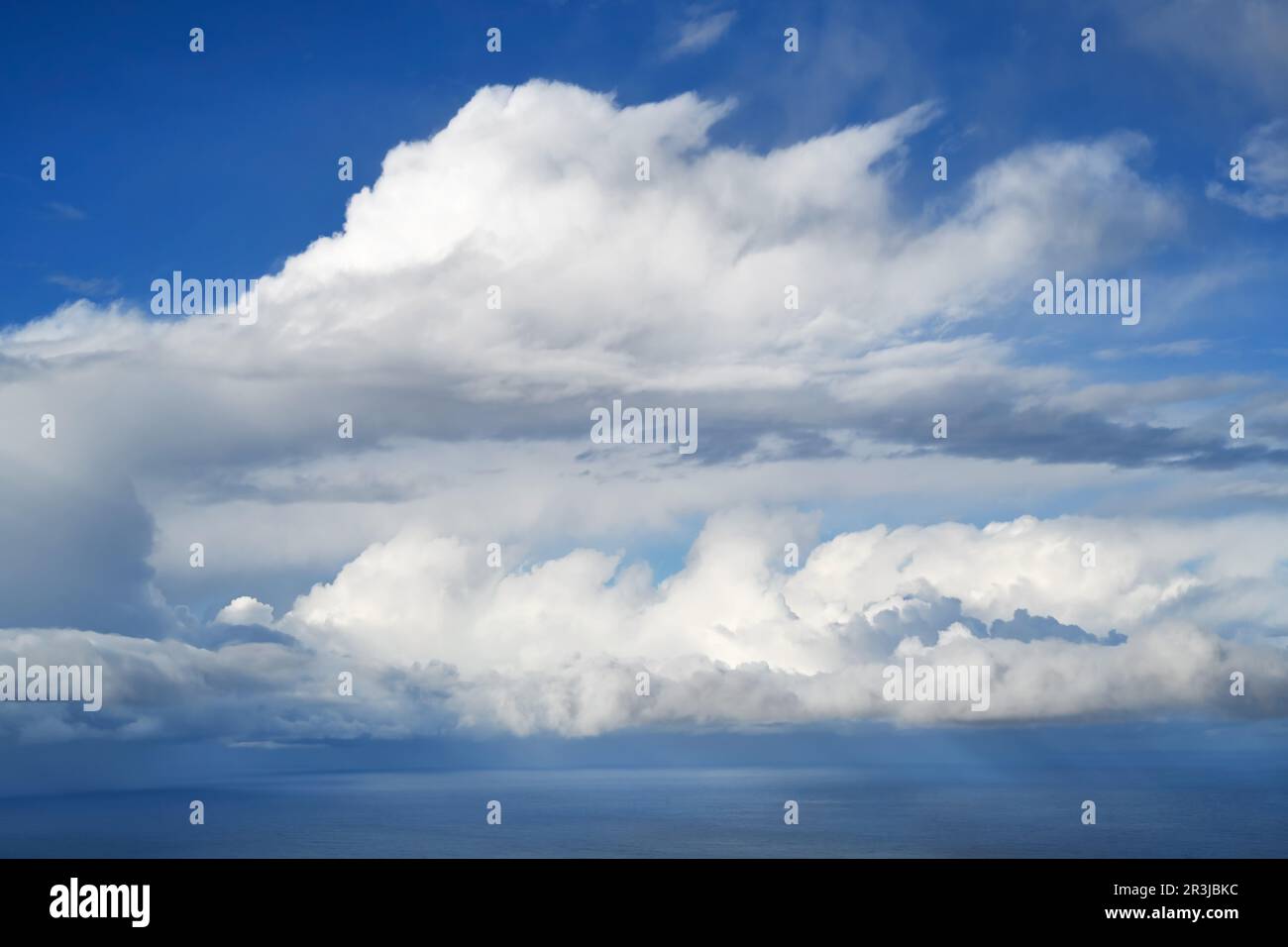Beautiful clouds over ocean hi-res stock photography and images - Alamy