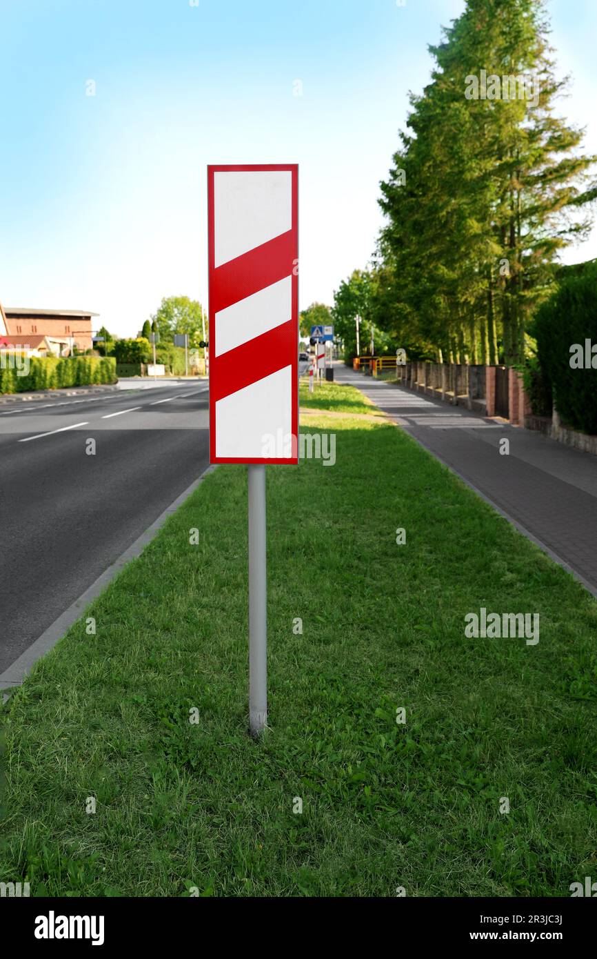Road sign Countdown Beacon to Railway Crossing on city street Stock ...