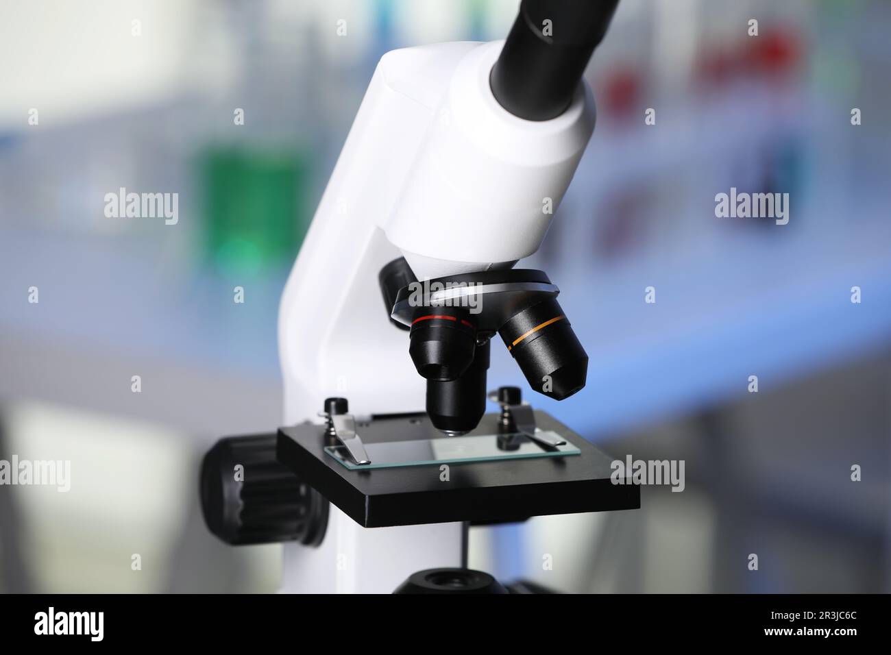 Modern medical microscope with glass slide in laboratory, closeup Stock ...