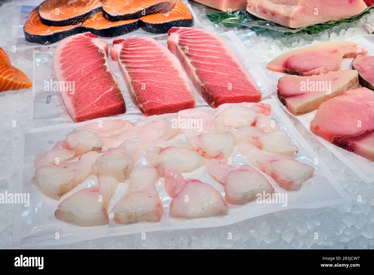 Different kinds of fish fillets for sale at a market in Spain Stock ...