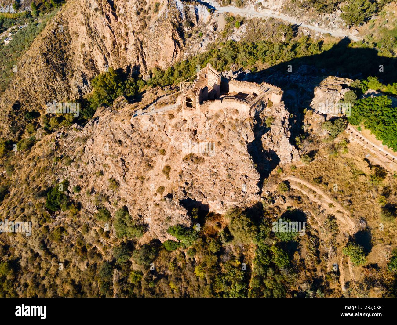 Lanjaron Castle or Castillo de los Moros aerial panoramic view, it is a ...