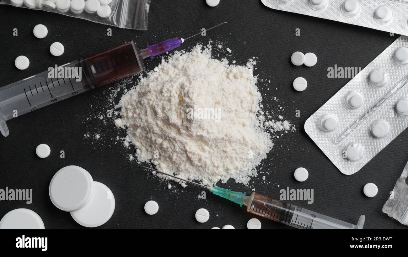Many different hard drugs on black background, flat lay Stock Photo - Alamy
