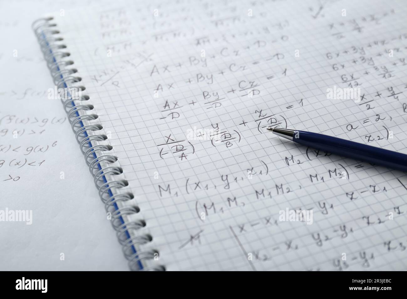 Notebook with different mathematical formulas and pen, closeup Stock ...