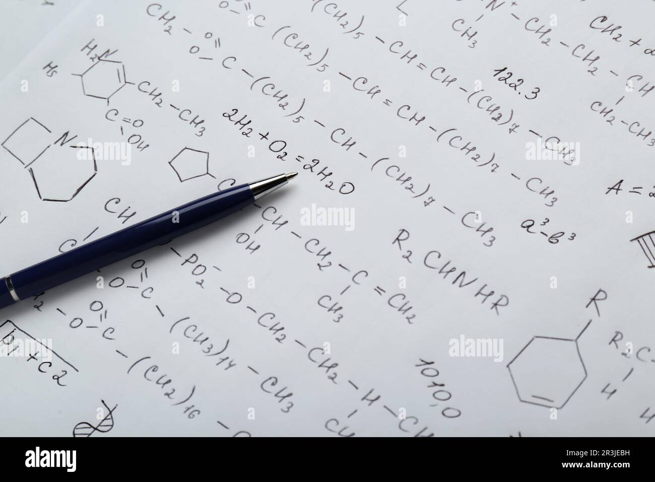 Sheet of paper with different chemical formulas and pen, closeup Stock ...
