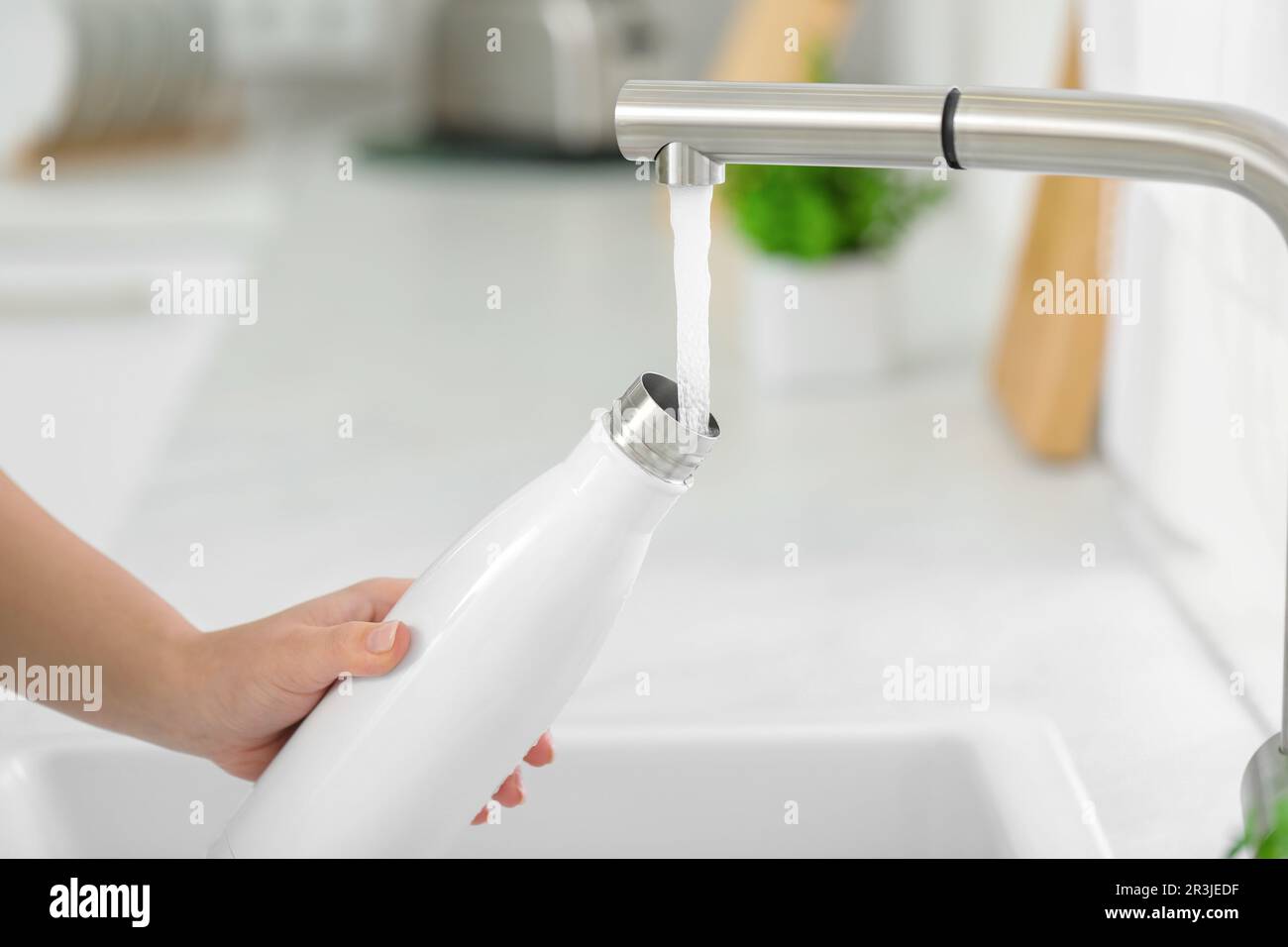 Tap water pouring from bottle hi-res stock photography and images - Alamy