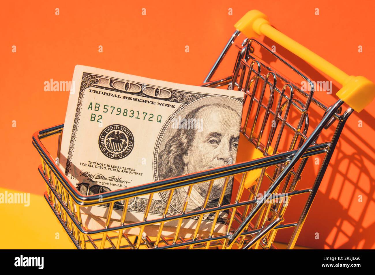 US dollar paper currency 100 banknote money Shopping trolley cart on ...