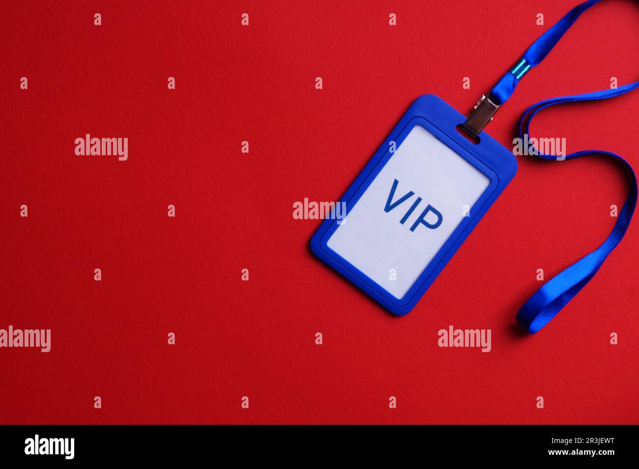 Plastic vip badge on red background, top view. Space for text Stock ...