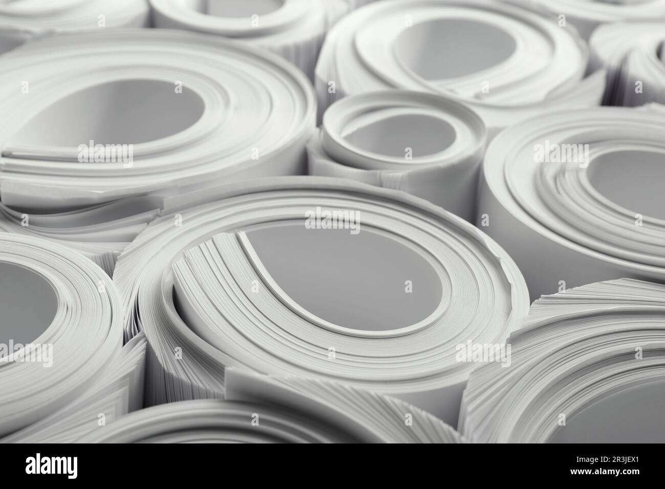 Rolled white paper sheets hi-res stock photography and images - Alamy