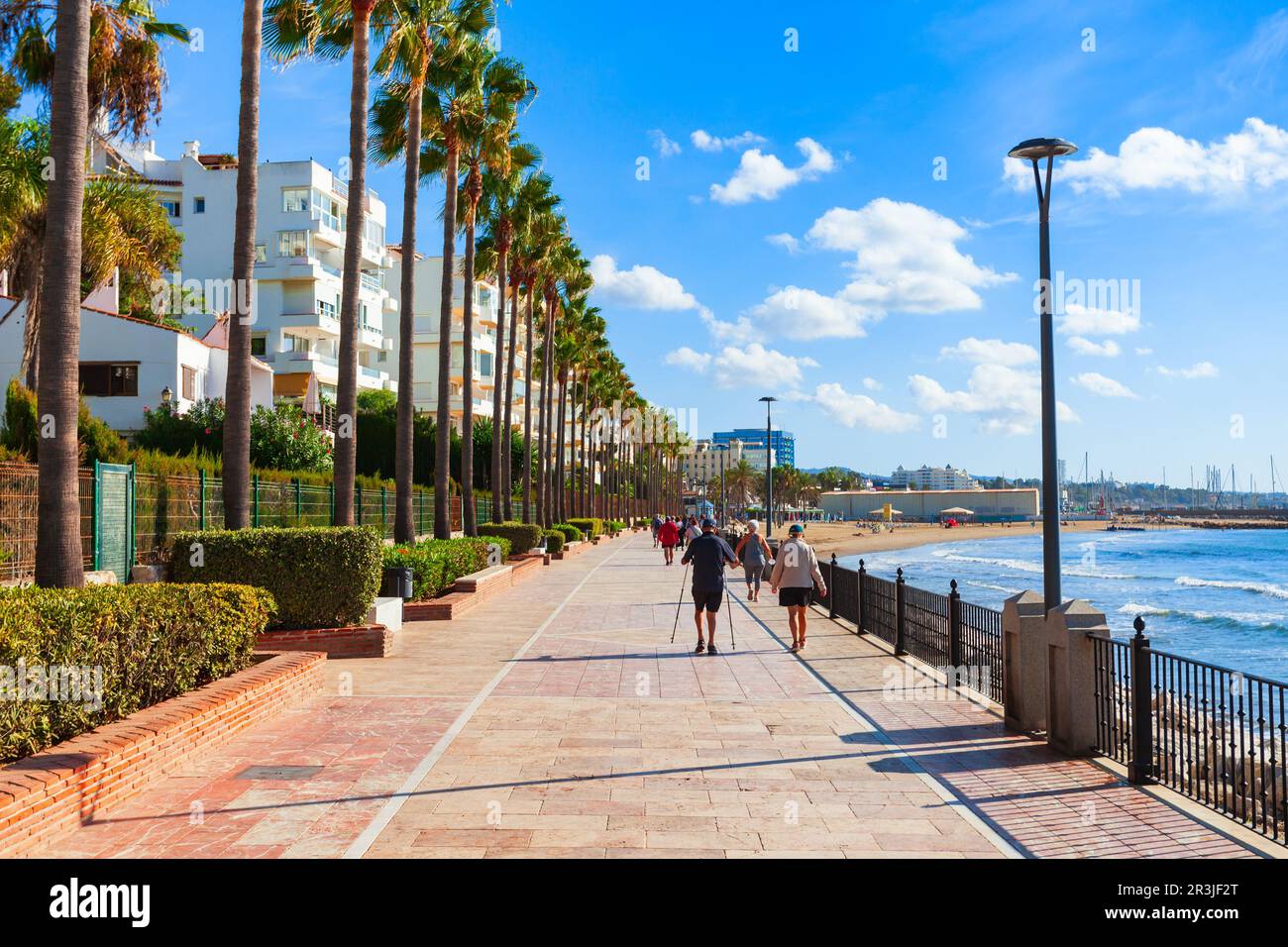 Marbella beach promenade. Marbella is a city in the province of Malaga ...