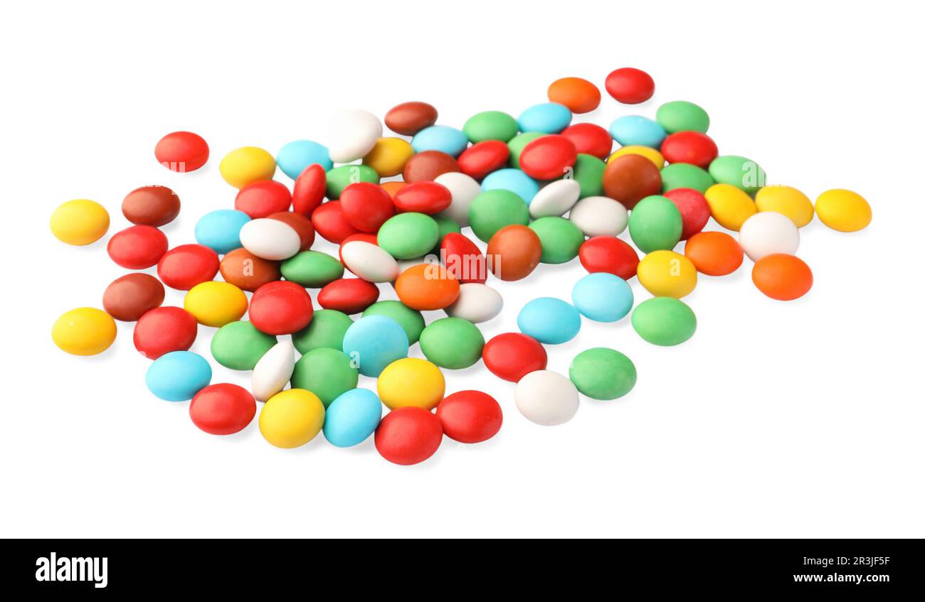 Many small colorful candies on white background Stock Photo - Alamy