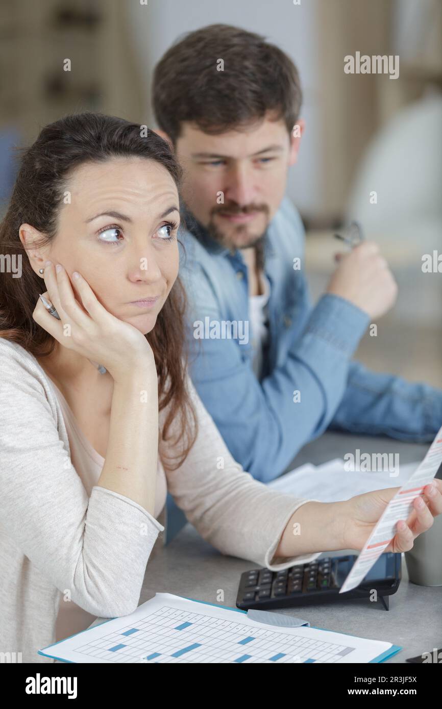 worried couple in the living room Stock Photo - Alamy