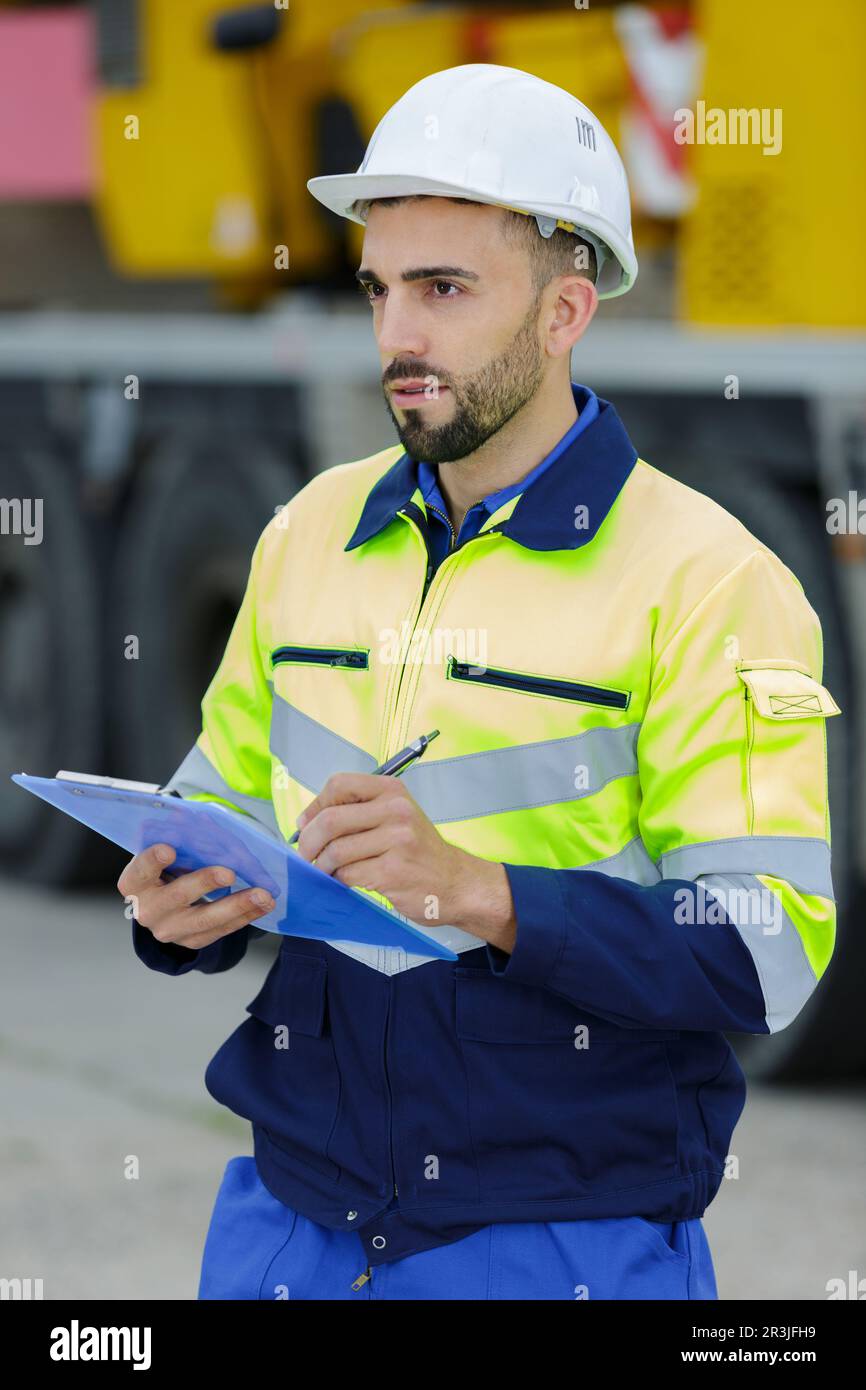 Back view male engineer clipboard hi-res stock photography and images ...